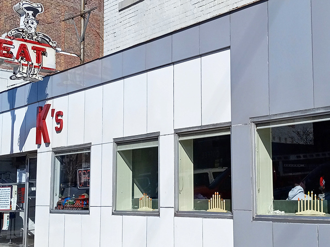 Classic white tile exterior that screams "authentic diner experience." This place hasn't changed because it doesn't need to!