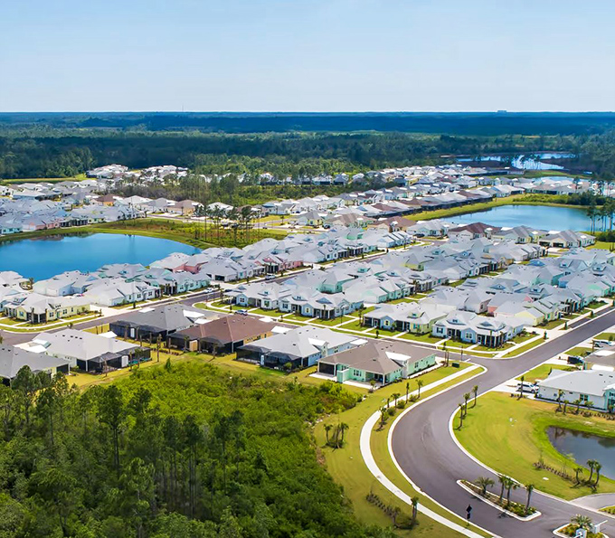 Paradise found! Aerial view of Latitude Margaritaville's neighborhoods shows why retirees trade snow shovels for golf carts and permanent vacation vibes.