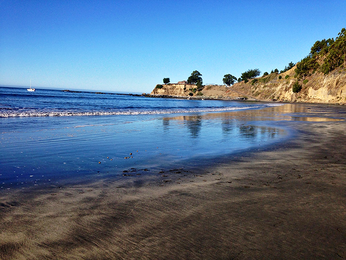 The morning light reveals Little Black Sands' secret – a pristine shoreline where footprints don't last long.
