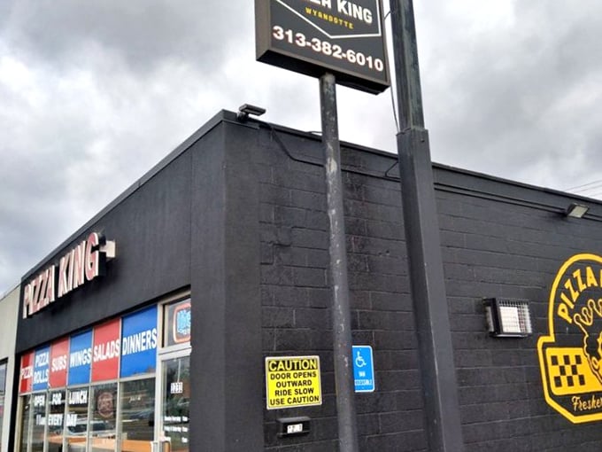 No fancy frills needed when the pizza is this good. Pizza King's simple storefront is like Clark Kent hiding Superman-level pizza powers.