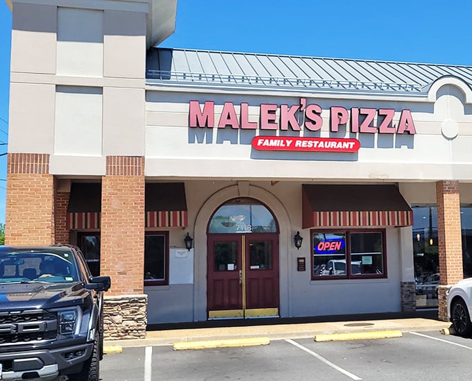Family restaurant vibes with serious pizza credentials. Malek's brick facade may be modest, but those ovens work magic.