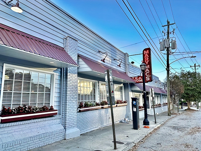 This white brick beauty with red awnings looks like where Andy Griffith would take Aunt Bee for Sunday dinner.