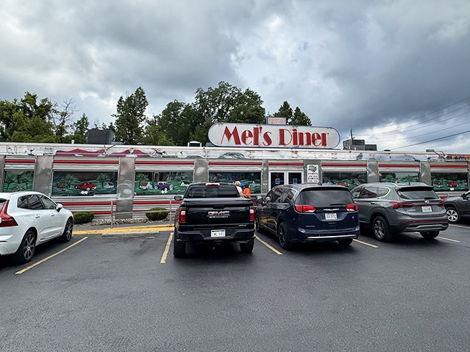 The painted murals and vintage car scenes along Mel's windows tell you this place serves nostalgia alongside their pancakes.