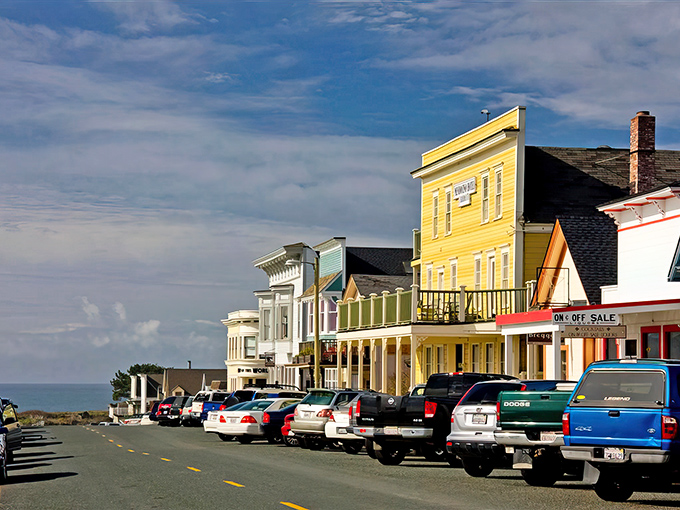 Colorful storefronts line Mendocino's main street, where time seems to move at the gentle pace of the ocean waves.