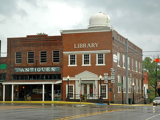 The town library stands proudly on the corner, a testament to small-town values where books and community still matter.