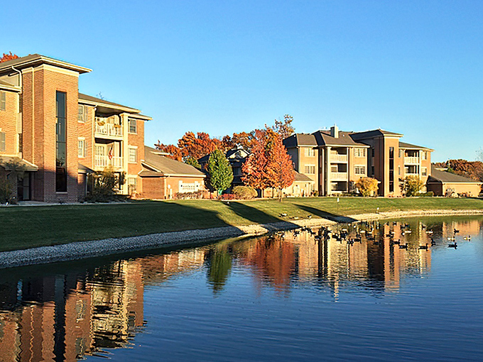 Waterfront living in Munster offers the perfect blend of tranquility and community. Those autumn reflections are worth every penny of your $1,800 budget!