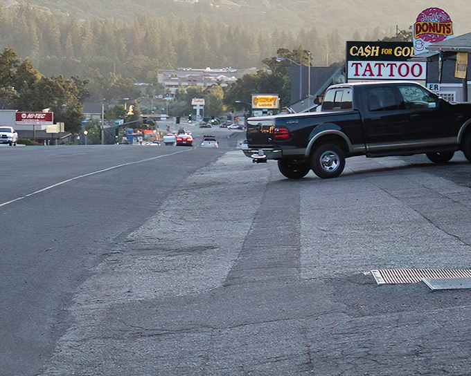 Where donuts meet gold and tattoos! This Oakhurst street corner offers the holy trinity of retirement splurges &ndash; sugar fixes, body art, and pawning your ex's jewelry.