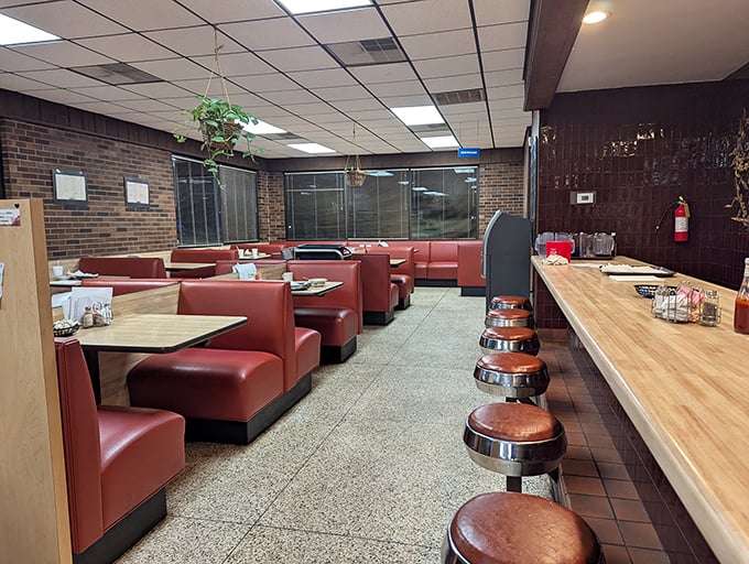 Classic red booths and counter stools await inside Peach Blossom Diner &ndash; where breakfast dreams come true and everybody knows your name.