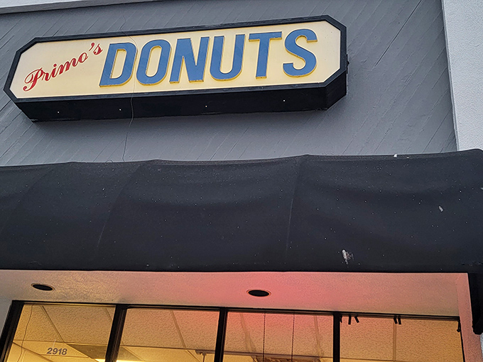 That vintage Primo's Donuts sign has witnessed decades of happy customers. Like a trusty old friend who always delivers sweet comfort.