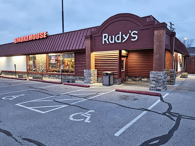 As evening falls, Rudy's Smokehouse glows with promise &ndash; where wood-fired dreams come true for barbecue pilgrims.