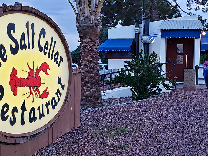 Dusk at the Salt Cellar transforms this Scottsdale gem. The palm tree and blue awnings create a perfect oasis for seafood cravings.