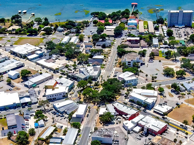 Lake Jackson sparkles beyond the rooftops, promising peaceful mornings and lazy afternoon fishing. 