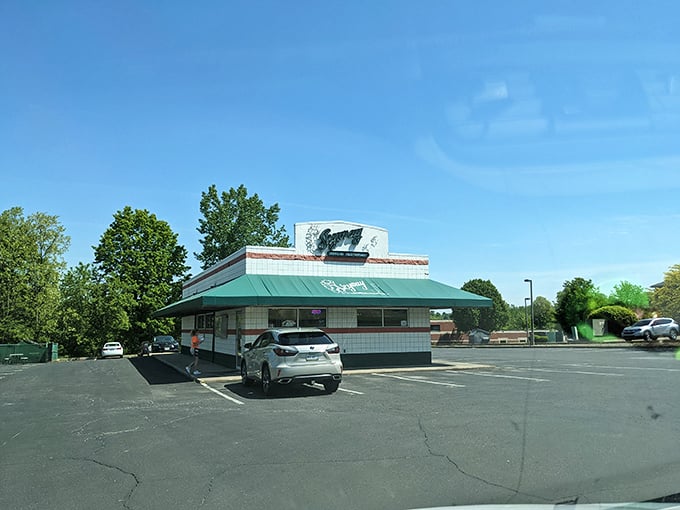 Pull up to this mint-green paradise where burgers come with a side of nostalgia and nobody rushes you through dinner.