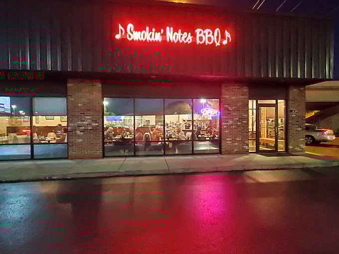 By night, Smokin' Notes BBQ glows like a beacon for hungry souls. That red neon isn't just a sign&mdash;it's a dinner bell.