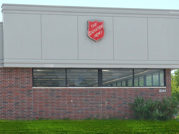 The iconic Salvation Army shield stands guard over this thrift paradise. A beacon of hope for both your wallet and the community it serves.