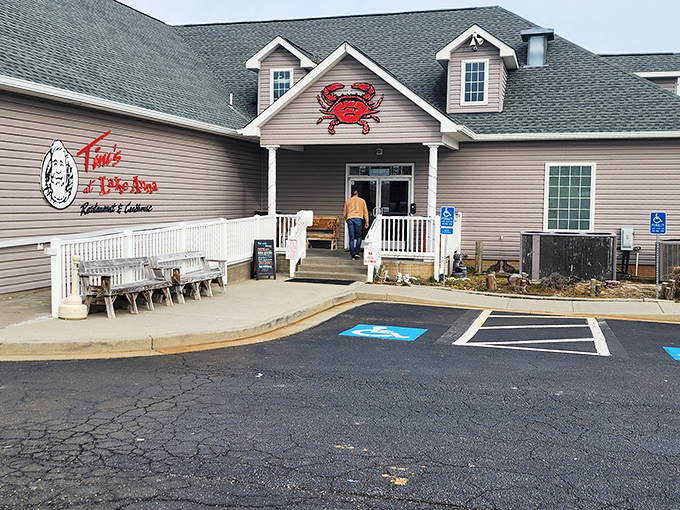 The charming exterior of Tim's features weathered wood benches where you can rest before embarking on your seafood adventure.