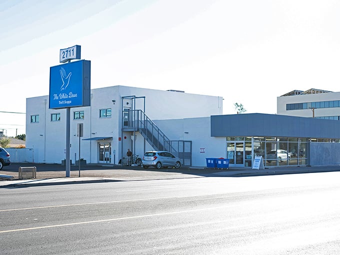 A pristine white building with blue accents&mdash;this thrift paradise is where wallet-friendly treasures await discovery.