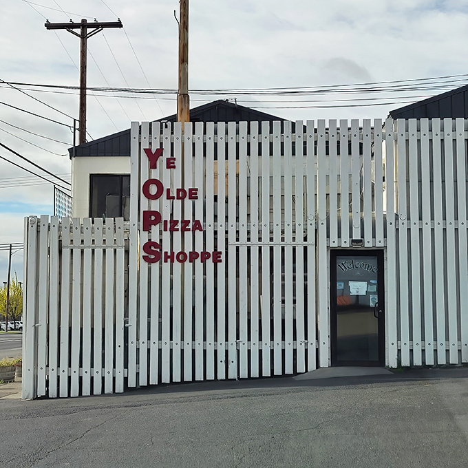 Like finding a pizza speakeasy! Those bold red letters practically whisper, "Yes, we've been making incredible pizza while nobody was looking."