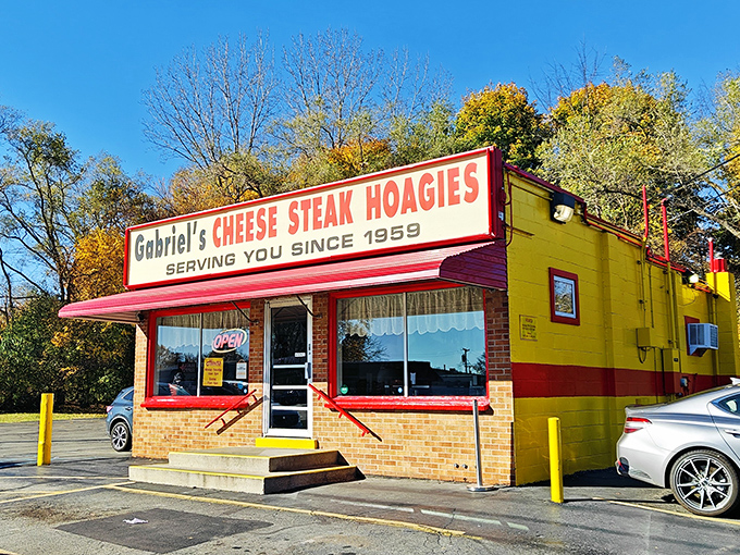 Fall colors frame this cheery yellow sandwich shop &ndash; a Philly cheesesteak paradise hiding in plain sight.