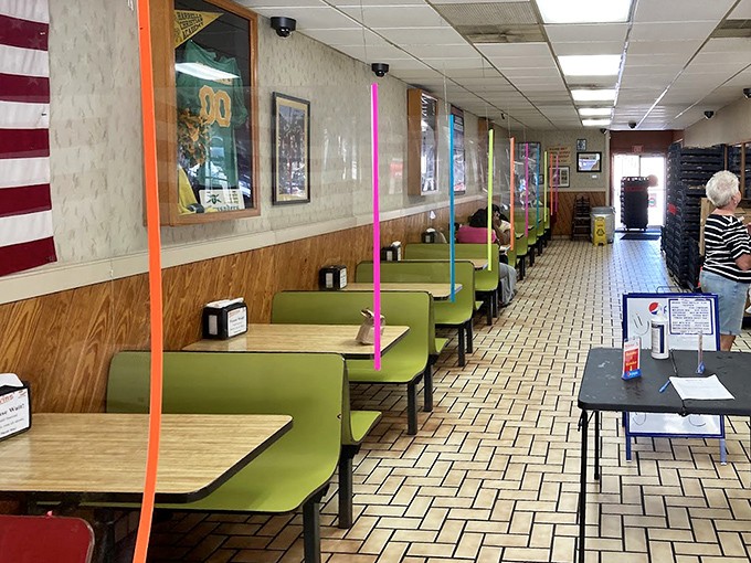 Time stands still inside Melvin's, where mint green booths and wood paneling create the perfect backdrop for burger-based memories. No Instagram filter required.