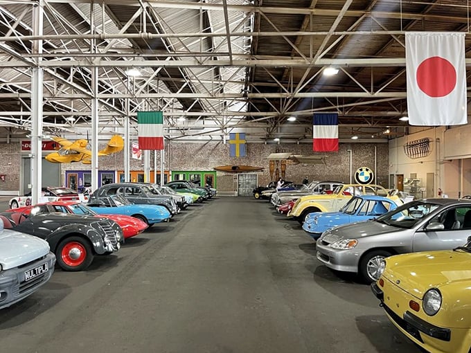 Automotive eye candy lines both sides of this aisle, where sleek sports cars mingle with quirky classics. It's speed dating for car enthusiasts!