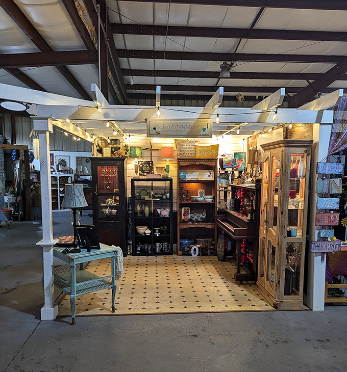 Step into this carefully curated booth where vintage treasures await under twinkling lights, each display telling stories of decades past.