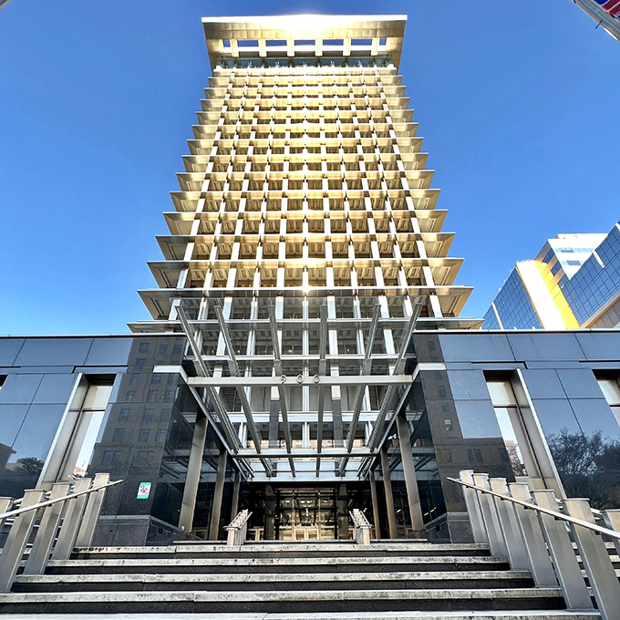 Richmond's City Hall reaches skyward with geometric precision, its honeycomb facade creating a modernist monument that somehow feels both retro-futuristic and timeless.