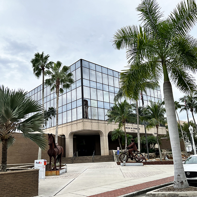 Modern meets tropical at this glass-fronted building, where palm trees stand like nature's doormen welcoming visitors to air-conditioned civilization.
