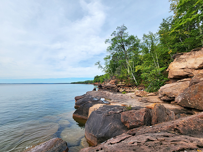 Lake Superior's artistic side on full display. These sandstone cliffs weren't just formed&mdash;they were sculpted, like God took a pottery class and really found His groove.