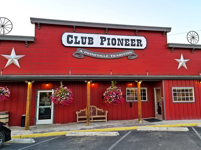 Club Pioneer's vibrant red exterior isn't just a building&mdash;it's a beacon calling hungry travelers home with the promise of Western hospitality and hearty meals.