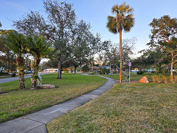 Clymer Park's winding paths invite leisurely strolls beneath towering palms &ndash; Florida's version of a meditation retreat without the awkward chanting.