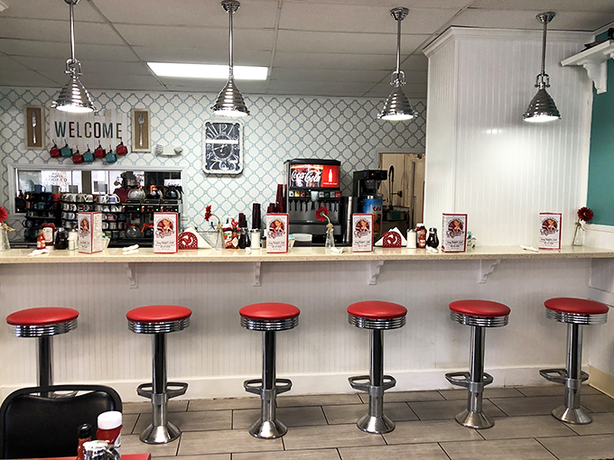 Classic chrome and red vinyl stools where breakfast dreams come true, one perfectly cooked egg at a time.