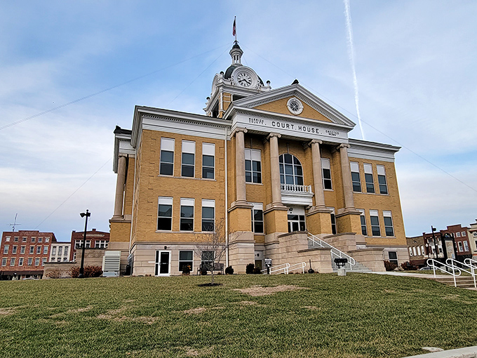 The majestic Warrick County Courthouse stands proudly as Boonville's crown jewel, its yellow-brick fa&ccedil;ade and stately columns telling stories of generations past.