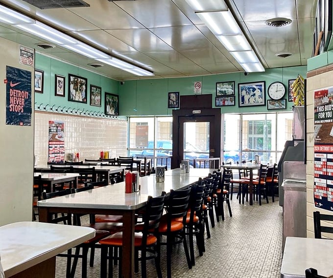 Mint green walls, simple tables, and decades of Detroit memories. This no-frills dining room has witnessed countless coney debates and late-night revelations.