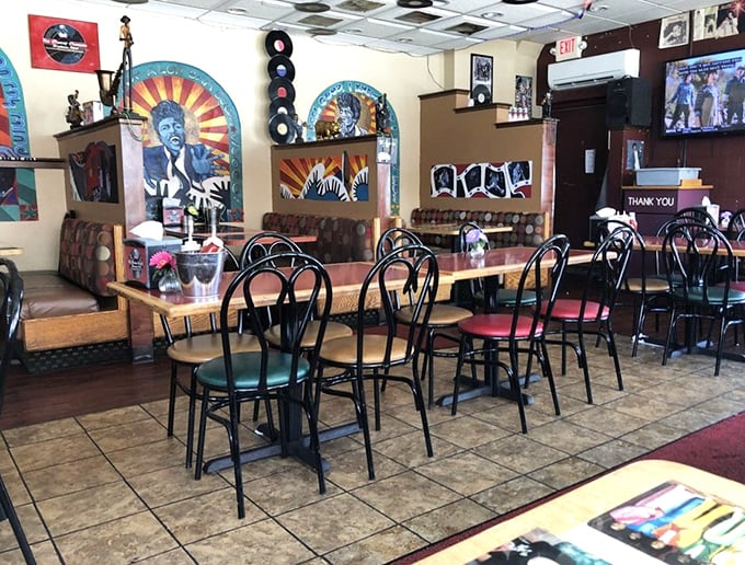 Music and soul food collide in this vibrant dining room where vinyl records and colorful artwork create the perfect backdrop for culinary magic.