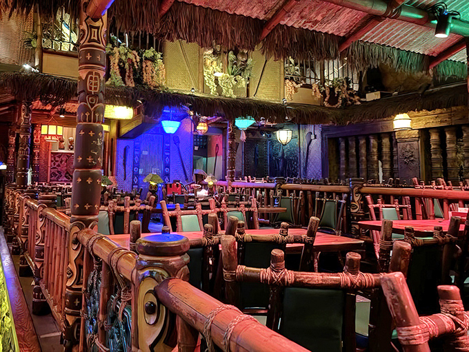 Step into a world where bamboo meets mood lighting. The dining room's carved tikis and thatched ceiling transport you straight to the South Pacific.