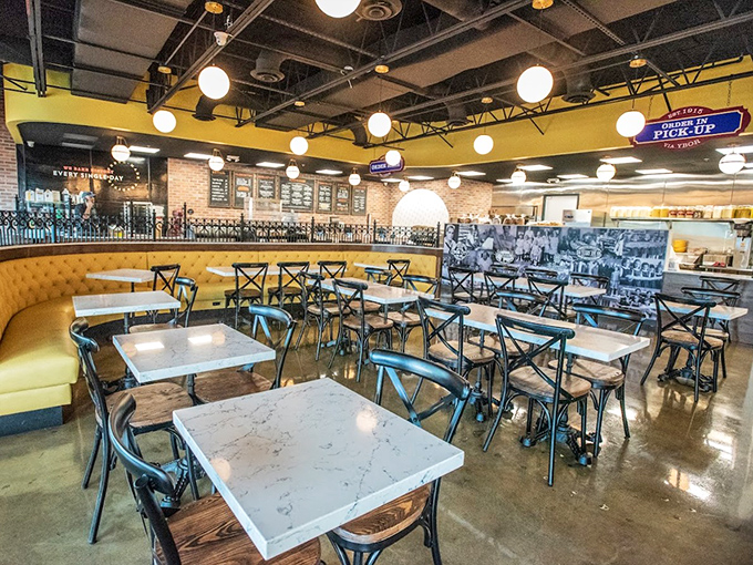 Sunshine yellow walls and exposed brick create the perfect backdrop for carb-induced happiness. The dining room feels like Cuba and Florida had a stylish baby.
