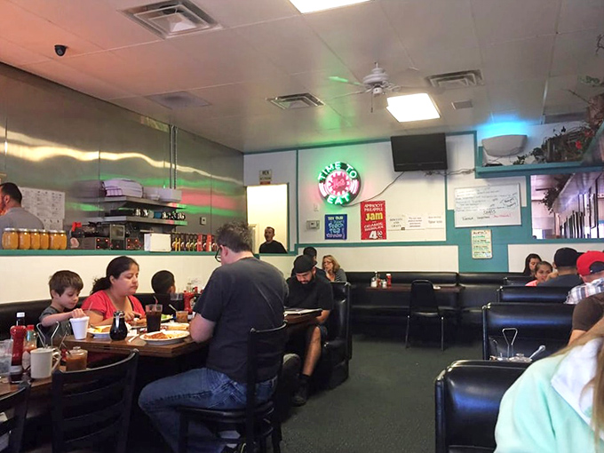 Inside Nat's, the classic diner atmosphere buzzes with conversation and the promise of comfort food that makes getting out of bed worthwhile.