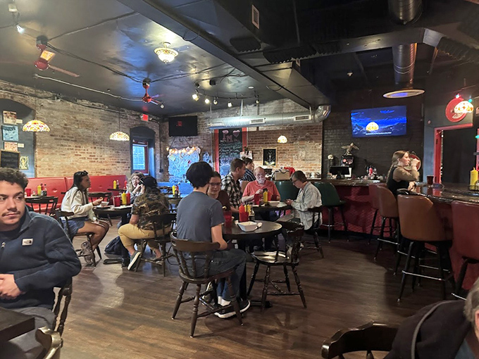 Inside, exposed brick walls and wooden tables create that perfect "come as you are" atmosphere where strangers become friends over shared pierogi platters.