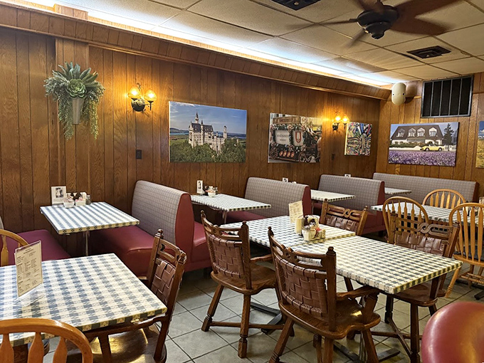 Wood-paneled warmth meets checkered charm in this dining room that feels like Sunday dinner at grandma's house.
