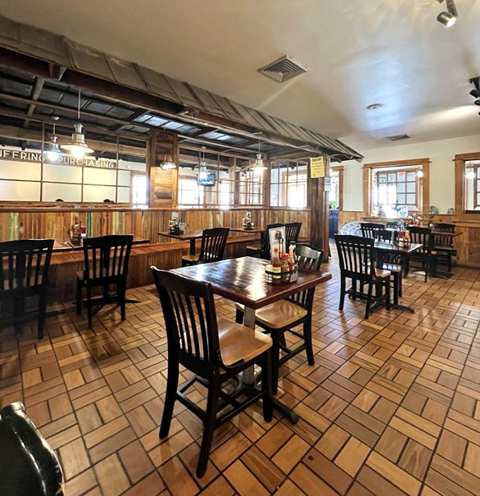 Wooden tables, simple chairs, and tile floors create the perfect backdrop for seafood feasts. No distractions here&mdash;just you and those legendary hush puppies.