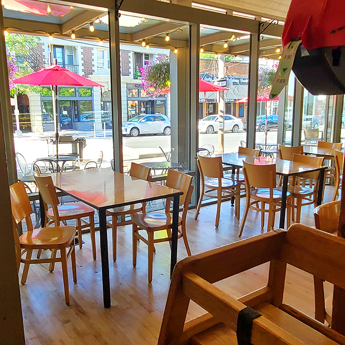 Simple wooden chairs and natural light create the perfect stage for pastry perfection to unfold.