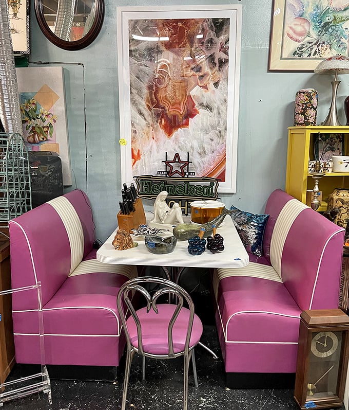 This retro pink diner booth isn't just furniture&mdash;it's a time machine waiting to transport you back to the days when milkshakes came with two straws.