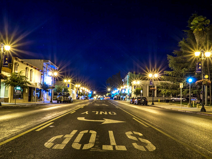 Night falls gently on Lakeport's downtown, where "rush hour" means three cars might be at the stoplight instead of two.