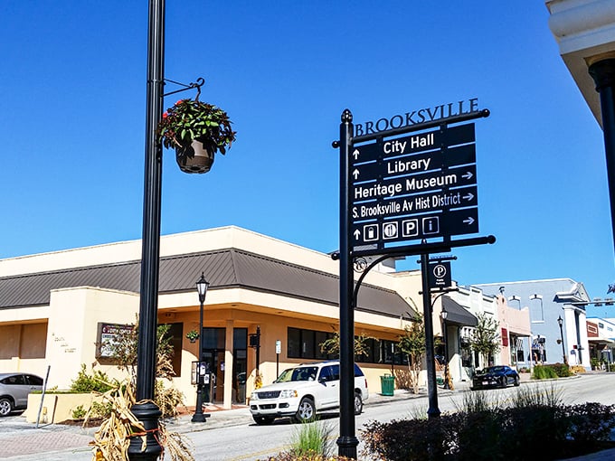 Hanging baskets and helpful signage welcome visitors to Brooksville's civic center, where small-town organization meets Florida sunshine.
