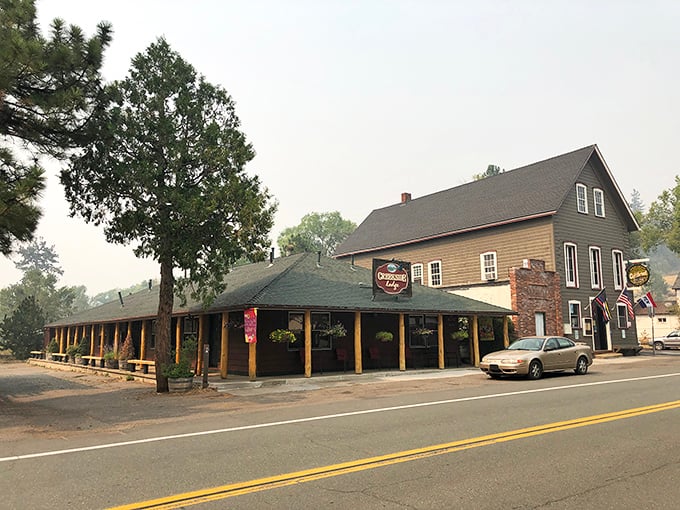 The Cutthroat Saloon beckons weary travelers with its rustic charm and the promise of cold drinks after a day of mountain adventures.