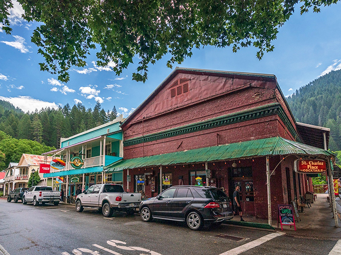 The St. Charles Place stands proudly under Sierra blue skies, a brick sentinel that's been serving mountain hospitality since gold rush dreamers arrived.