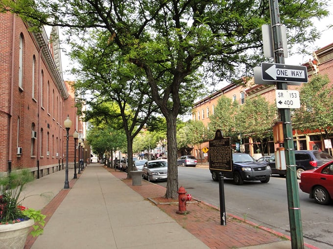 Tree-lined streets and brick sidewalks invite leisurely exploration. This isn't a town that rushes you—it's one that welcomes you to slow down and notice the details.
