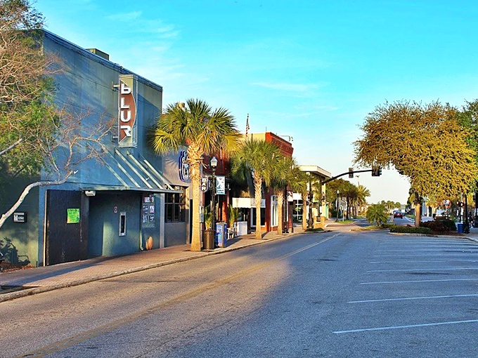 Main Street's palm-lined storefronts invite leisurely exploration. The kind of street where you might plan to spend an hour but happily lose an entire afternoon.