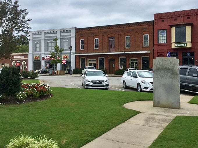 These historic storefronts aren't just preserved&mdash;they're alive! Each building tells a story while housing businesses that keep Edgefield's downtown humming with activity.
